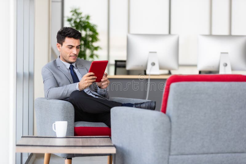 Businessman Uses Tablet Computer in Break Time Stock Image - Image of ...