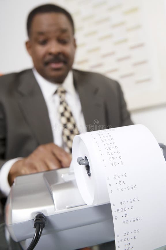 Businessman Using an Adding Machine Stock Photo - Image of ...