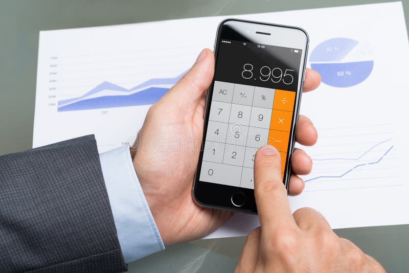 Businessman Using Calculator on Apple IPhone 6 at Table Editorial Stock ...