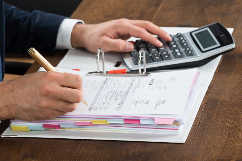 Calculator with invoice stock photo. Image of economy - 7007066