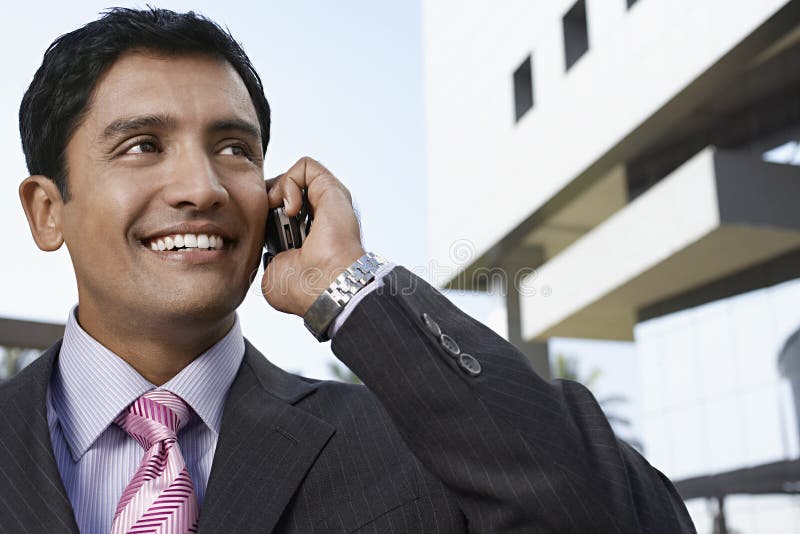 Businessman Using Cell Phone in Front of Building Stock Photo - Image ...