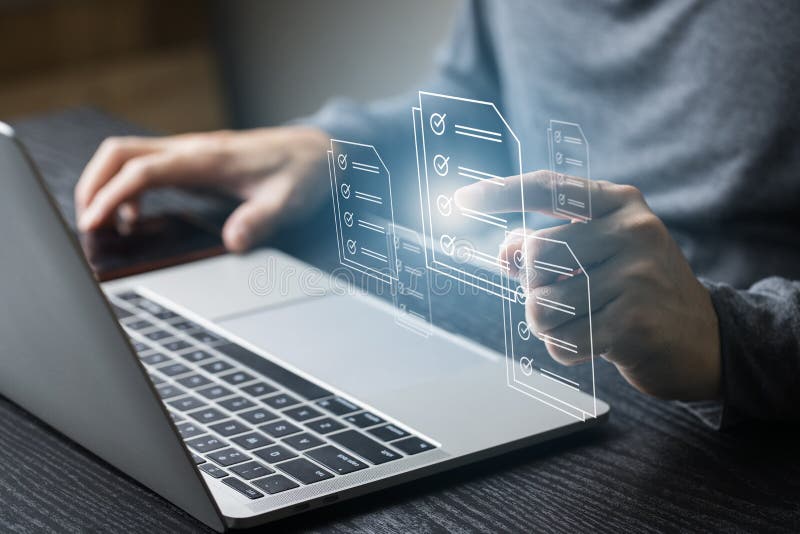 Businessman Using Computer Laptop on E Document on Digital Tablet , E ...