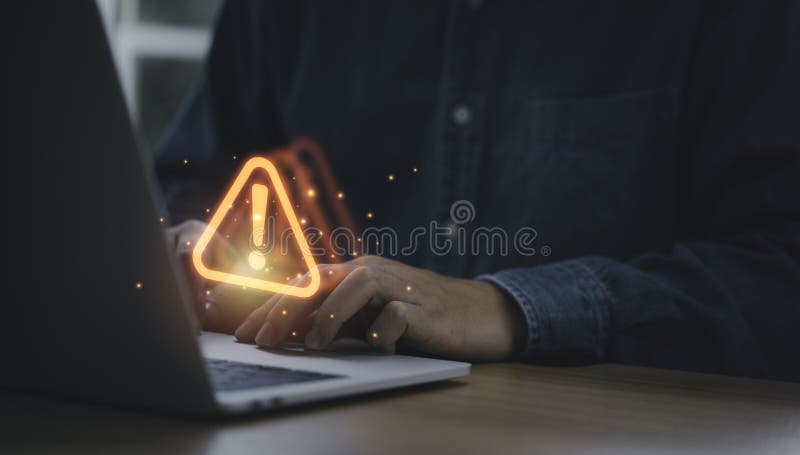 Businessman Using Computer Laptop With Red Triangle Caution Warning