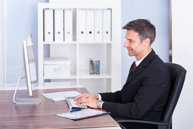 Businessman using computer stock image. Image of adult - 47173345