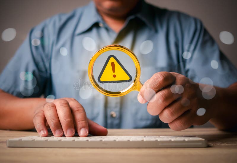Businessman Using Computer Searching Magnifying Glass Triangle Caution ...