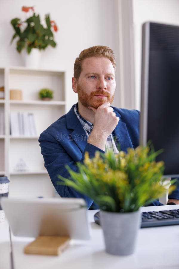 Businessman Using Computer while Working in an Office Stock Image ...