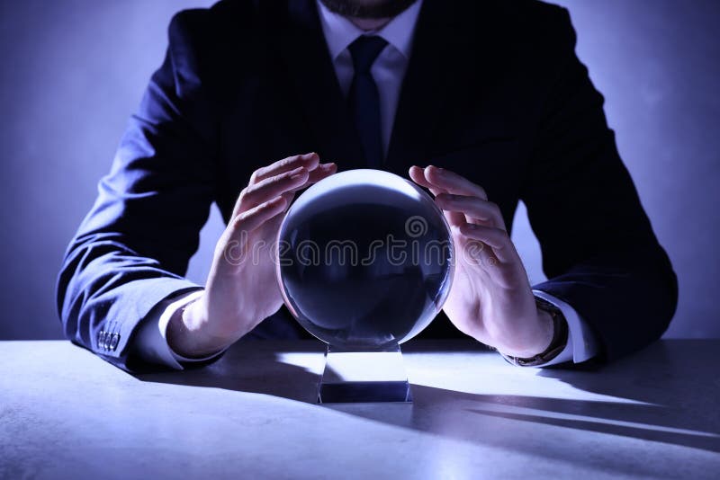 Businessman Using Crystal Ball To Predict Future at Table, Closeup ...