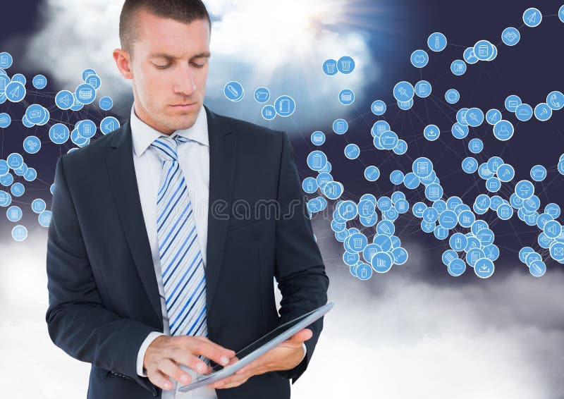 Businessman Using Digital Tablet Against Technology Icons in Sky Stock ...