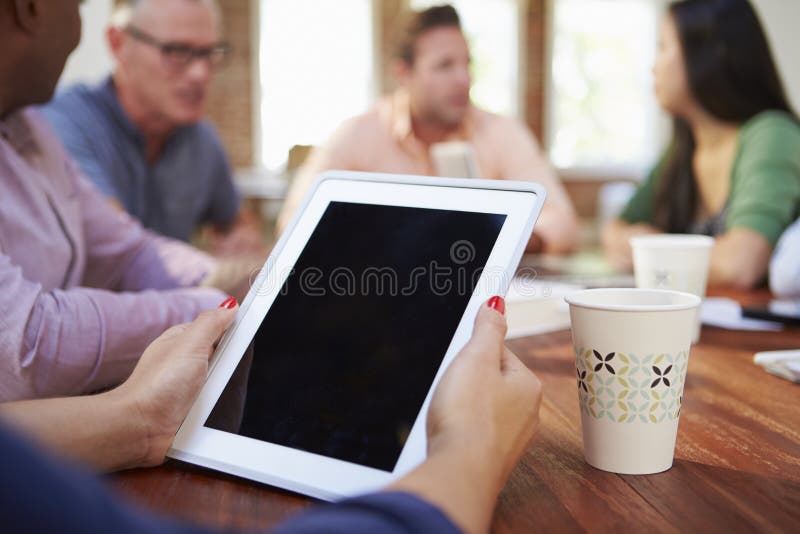 Businessman Using Digital Tablet in Meeting Stock Photo - Image of ...