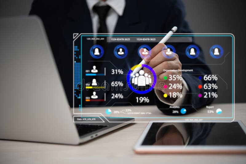 Businessman Using Futuristic Virtual Interface with Data Analytics and ...