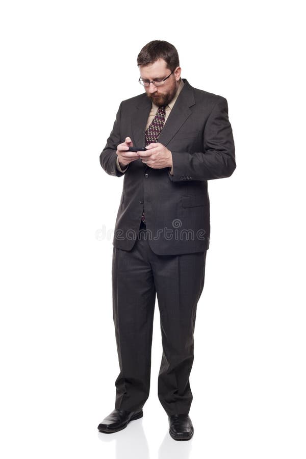 Businessman using a gadget stock image. Image of shot - 16462209