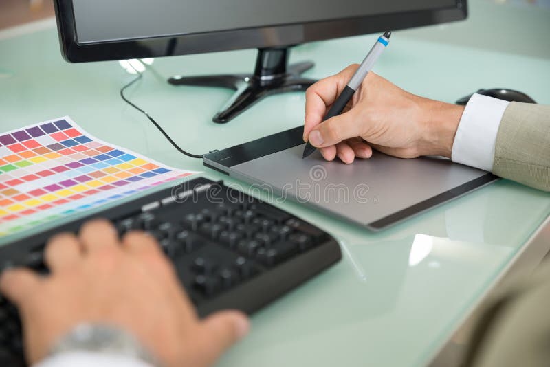 Businessman Using Graphic Tablet Stock Photo - Image of office ...