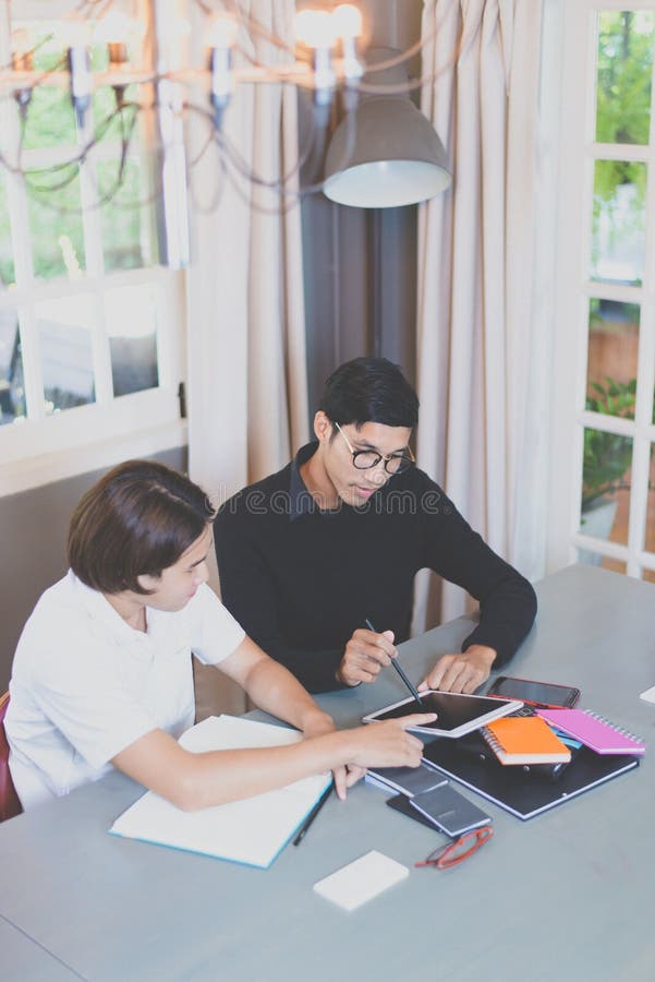 Businessman Using Ideas while Working with Tablets at Office Stock ...
