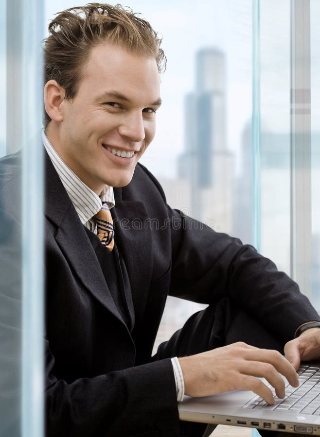 Businessman using laptop stock photo. Image of looking - 11292808