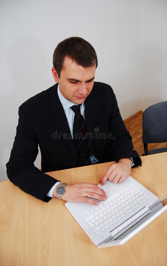 Businessman using laptop stock image. Image of typing - 3651755