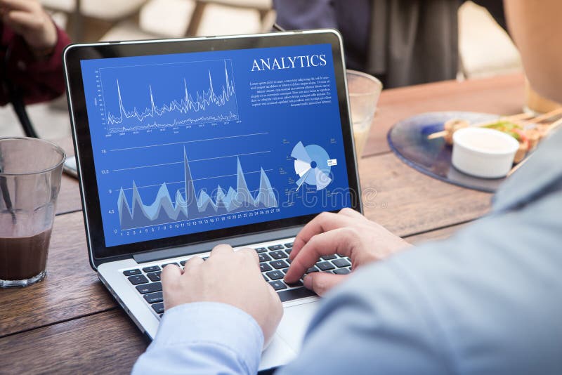 Businessman Using Laptop with Analytics Data Concept Stock Photo ...