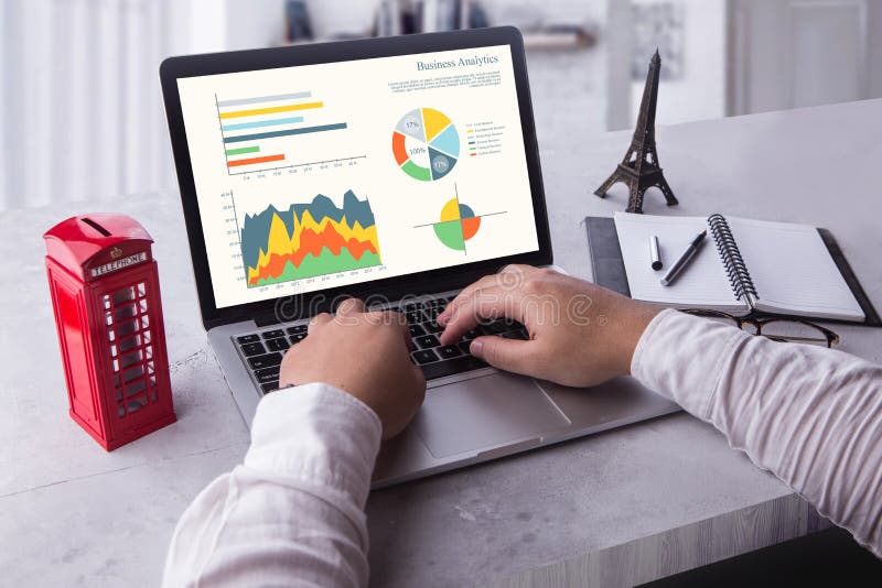 Businessman Using Laptop Analyzing Statistics Data on Laptop Screen ...