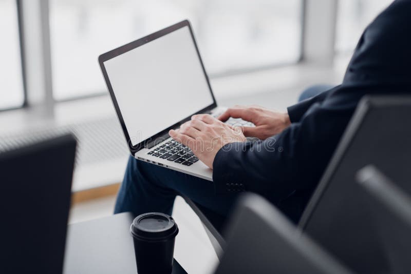 Businessman Using Laptop with Blank Screen at Public Place Stock Photo ...