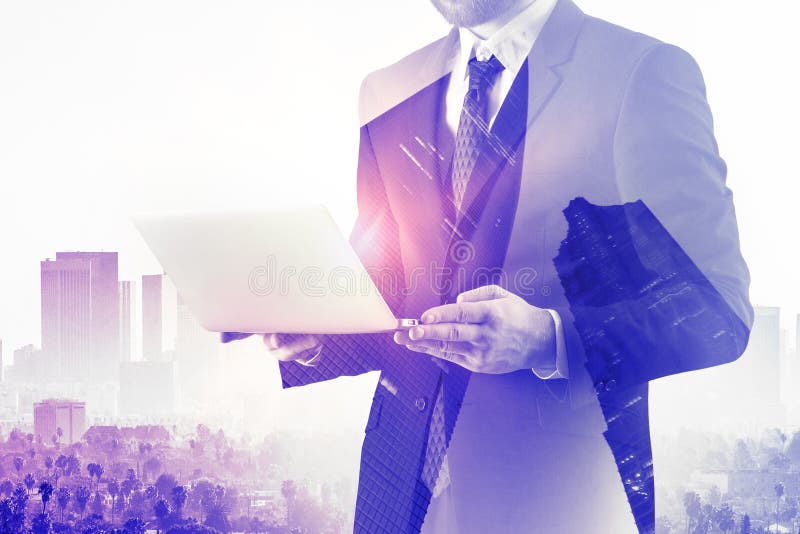 Businessman using laptop stock photo. Image of device - 109588970