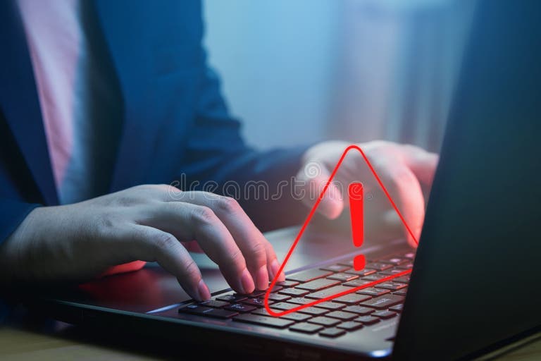 Businessman Using Laptop Computer with Alerts, Warning Triangles ...