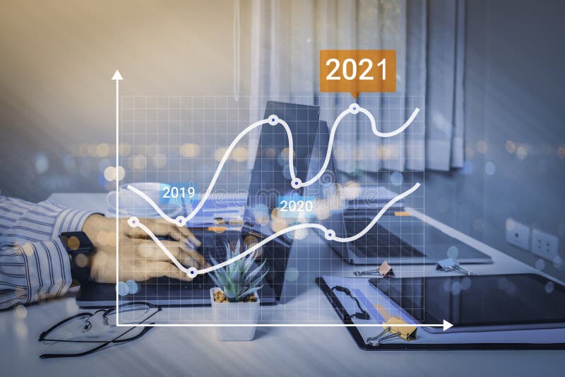 Businessman Using a Laptop Computer with Data Analytics and Statistics ...