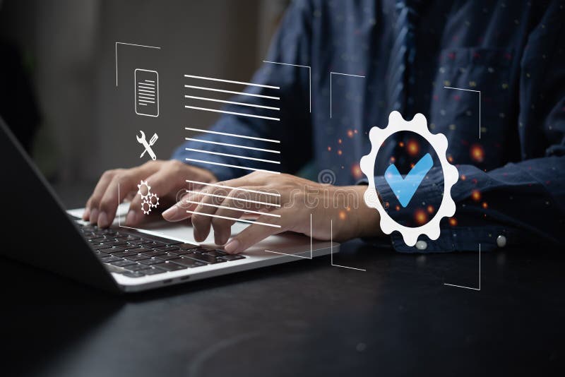 Businessman Using Laptop Computer with Quality Assurance and Document ...