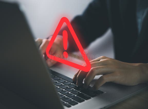 Businessman Using Laptop Showing Warning Triangle and Exclamation Sign ...