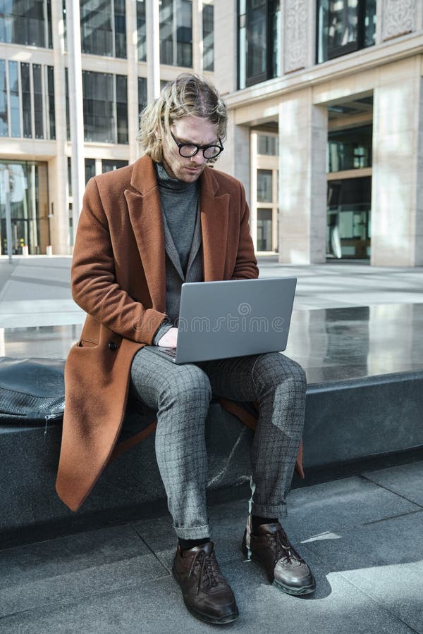 Businessman Using Laptop at Work Stock Photo - Image of confidence ...