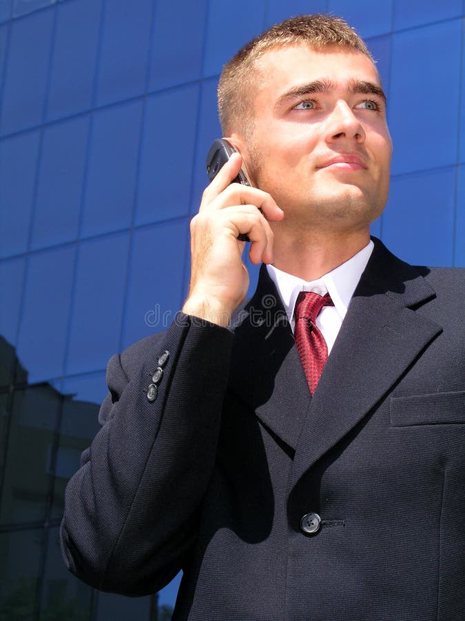 Businessman Using a Mobile Phone Stock Photo - Image of full, office ...