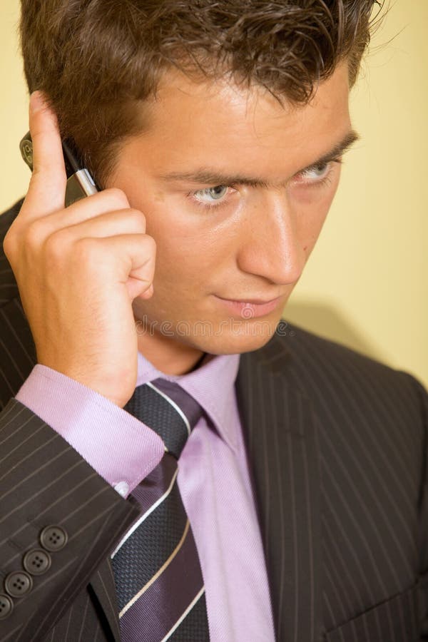 Businessman Using Mobile Phone at Office Stock Image - Image of ...