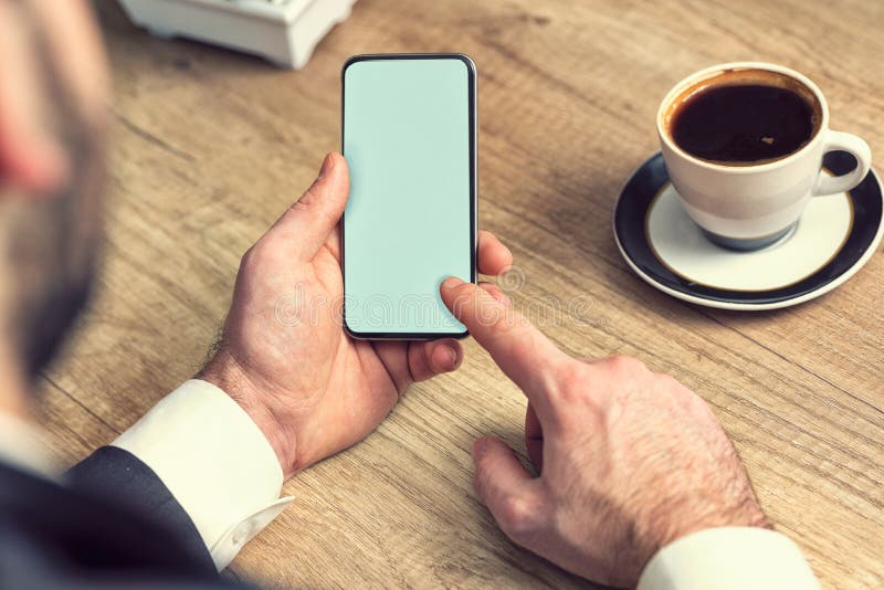 Businessman Using Mockup of Cell Phone at Workplace Stock Image - Image ...