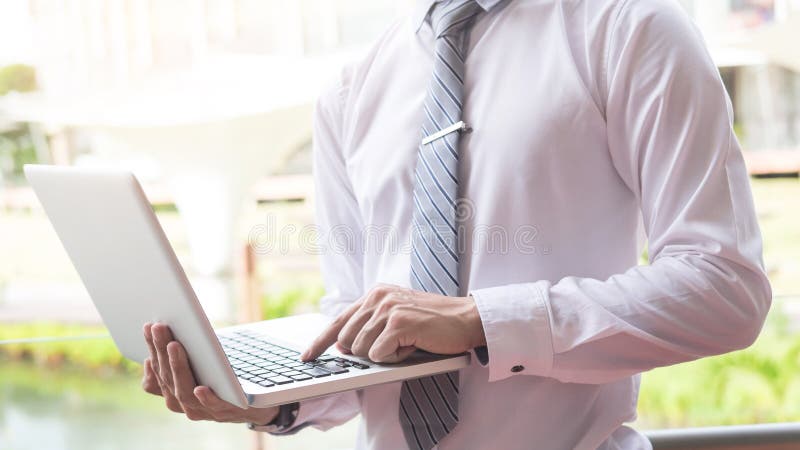 Businessman Using Modern Laptop for Working at Personal Space Outdoor ...