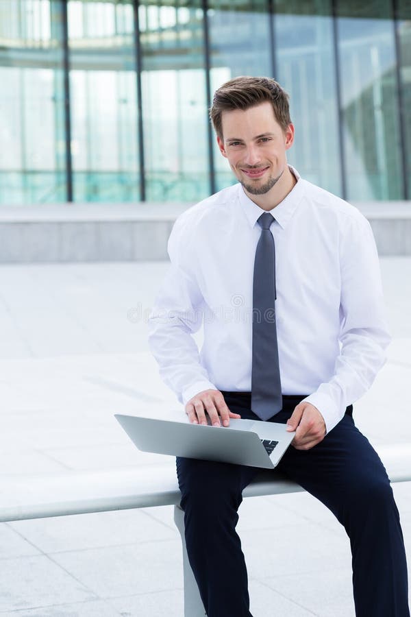 Businessman Using the Notebook Computer at Outdoor Stock Photo - Image ...