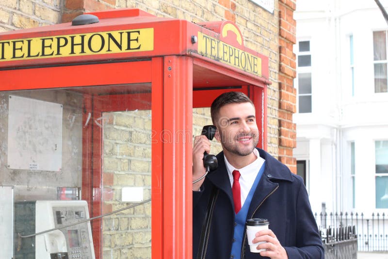 Businessman Using a Red Telephone Box Stock Photo - Image of english ...