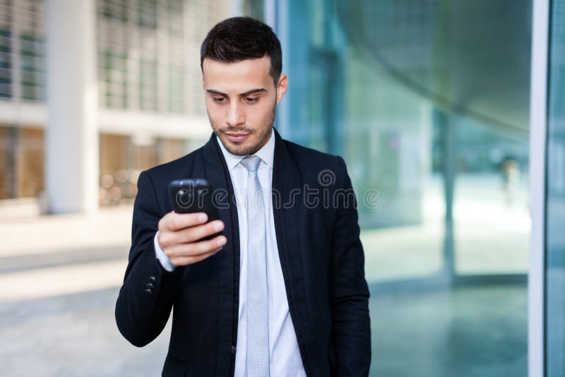 Businessman Using a Smartphone Stock Image - Image of mobile ...