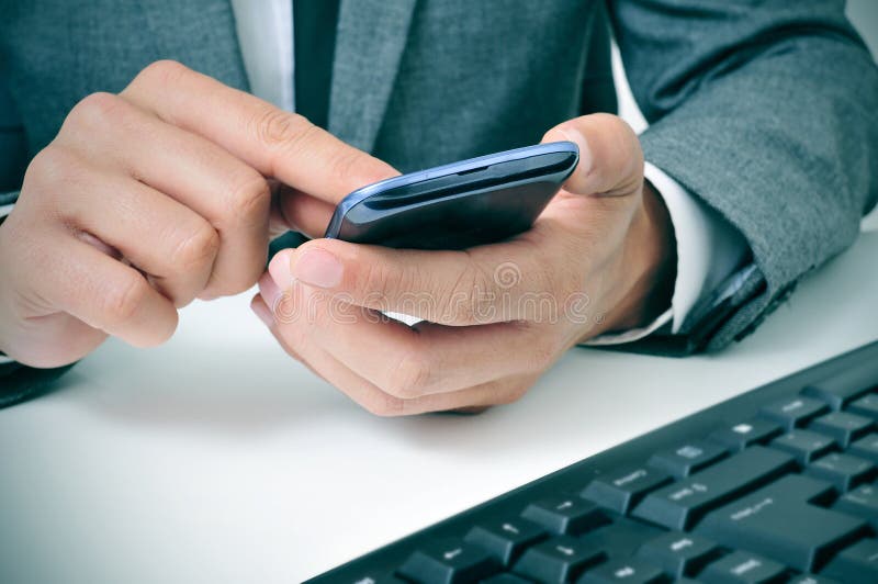 Businessman Using Smartphone and Laptop Computer Stock Image - Image of ...