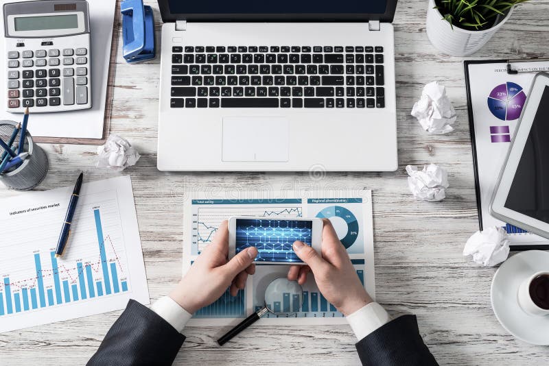 Businessman Using Smartphone at Office Desk Stock Photo - Image of ...