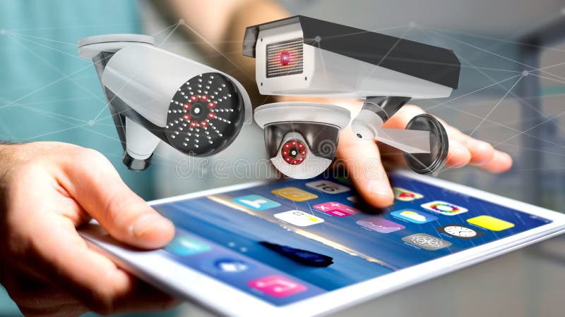 Businessman Using a Smartphone with a Security Camera System and Stock ...