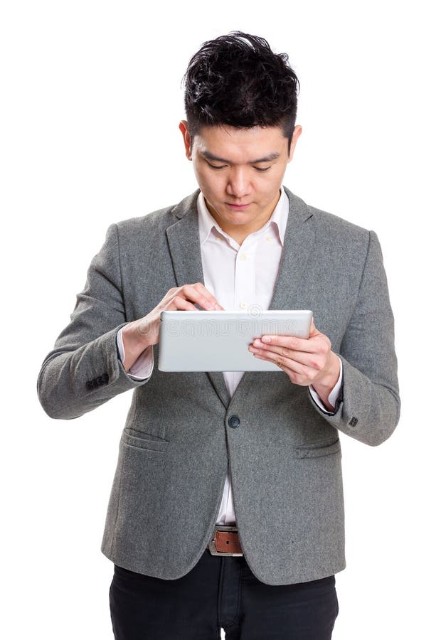 Businessman using tablet stock image. Image of handsome - 40657803