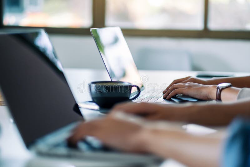Businessman Using and Working on Laptop Computer Together Stock Image ...