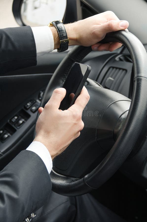 Businessman Viewing His Phone. Stock Image - Image of hand, auto: 76671921