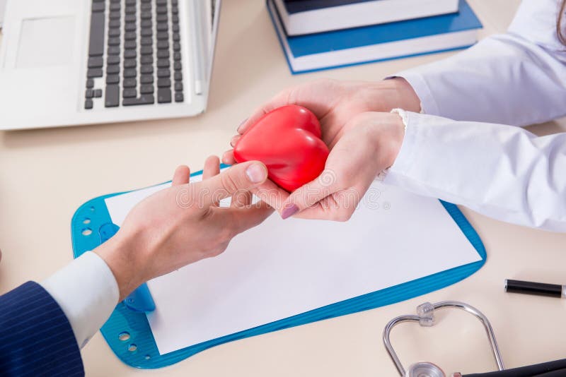 The Businessman Visiting Cardiologist for Routine Check-up Stock Photo ...