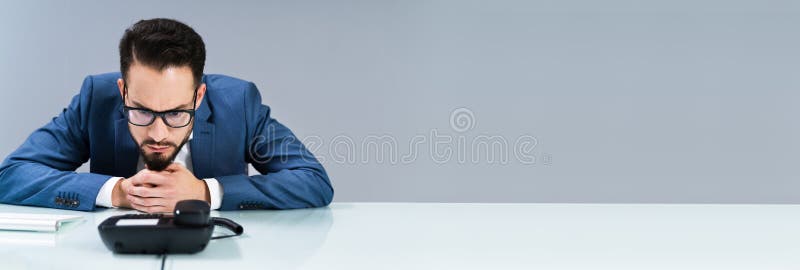 Businessman Waiting for a Call on Landline Stock Photo - Image of ...