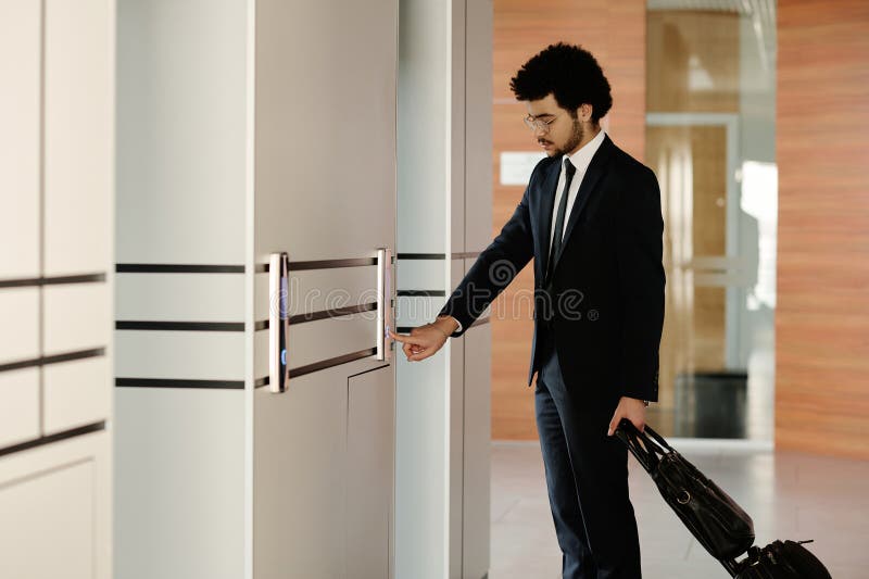 Businessman Waiting for the Elevator Stock Photo - Image of office ...