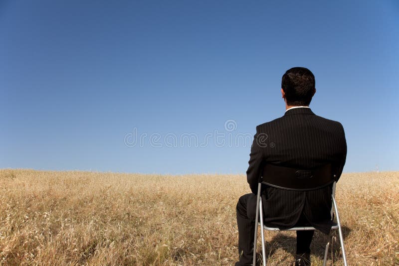 Businessman Waiting at the Field Stock Photo - Image of confident, blue ...