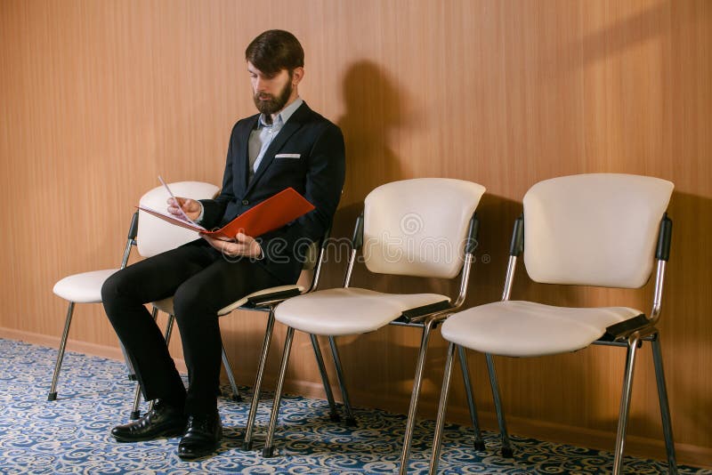 Businessman waiting stock image. Image of hand, serious - 87438725