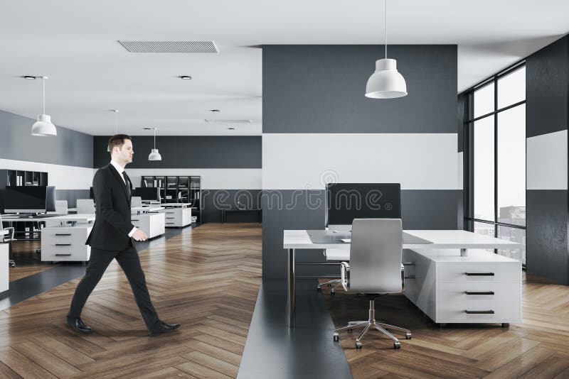 Businessman Walking in Modern Office Interior Stock Photo - Image of ...