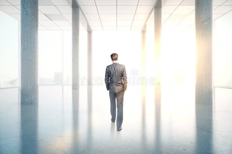 Businessman Walking in Room Stock Image - Image of business, concept ...