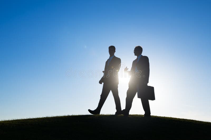Businessman Walking Together Conversation Talking Stock Photo - Image ...