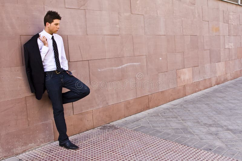 Businessman on wall stock image. Image of pensive, financial - 4669989
